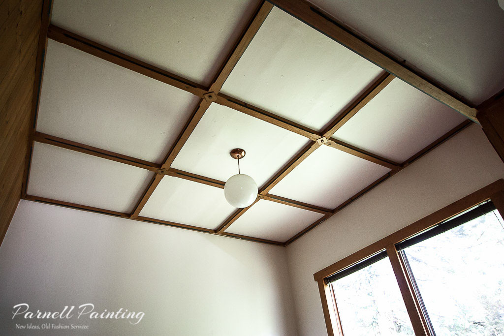 White Ceiling With Grid Work Of Natural Wood
